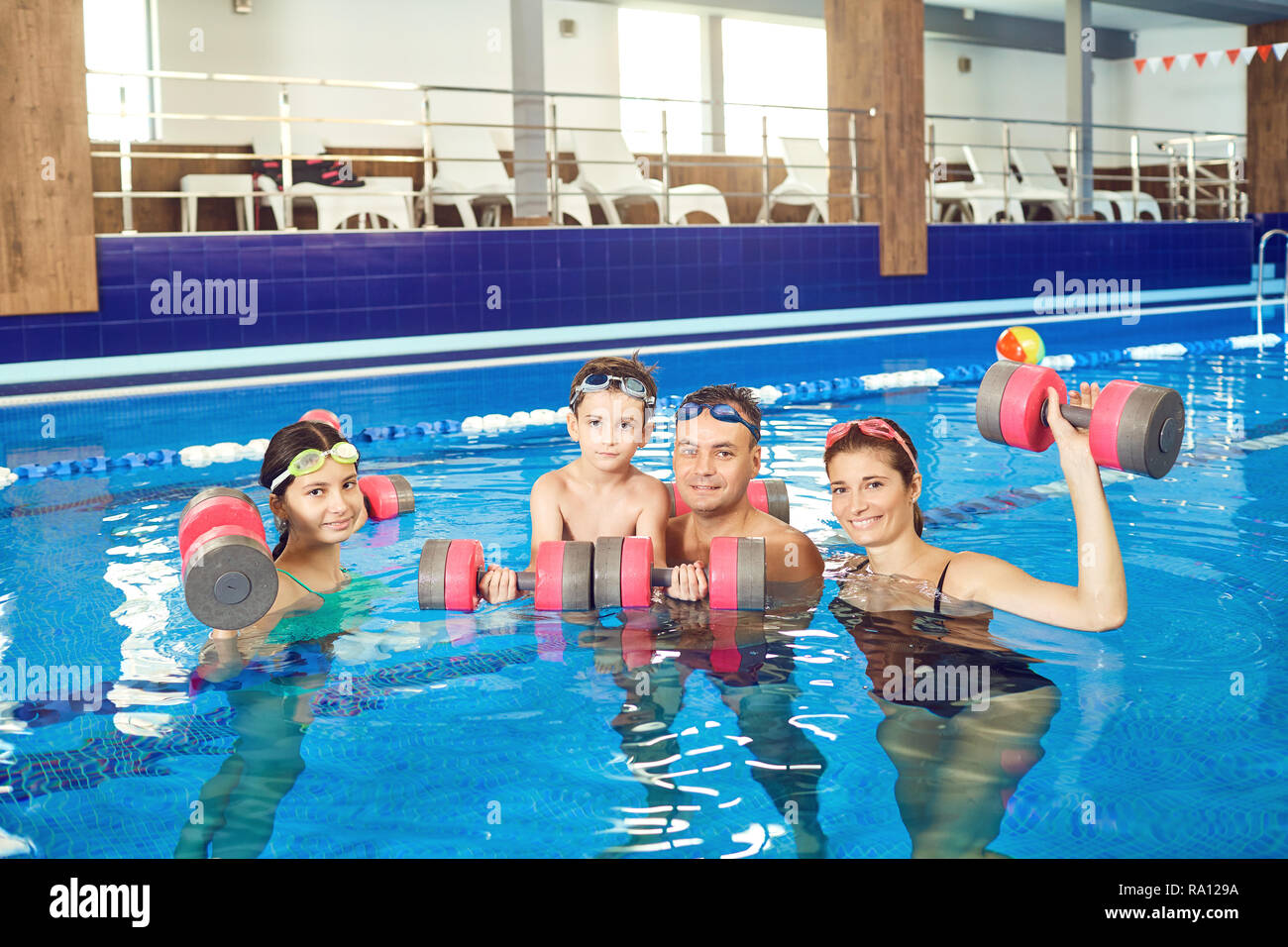 Family swimming pool holidays hi-res stock photography and images - Alamy