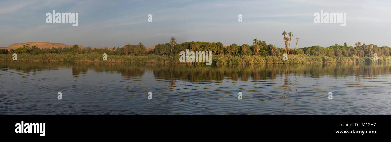 View across large wide river Nile in Egypt through rural countryside ...