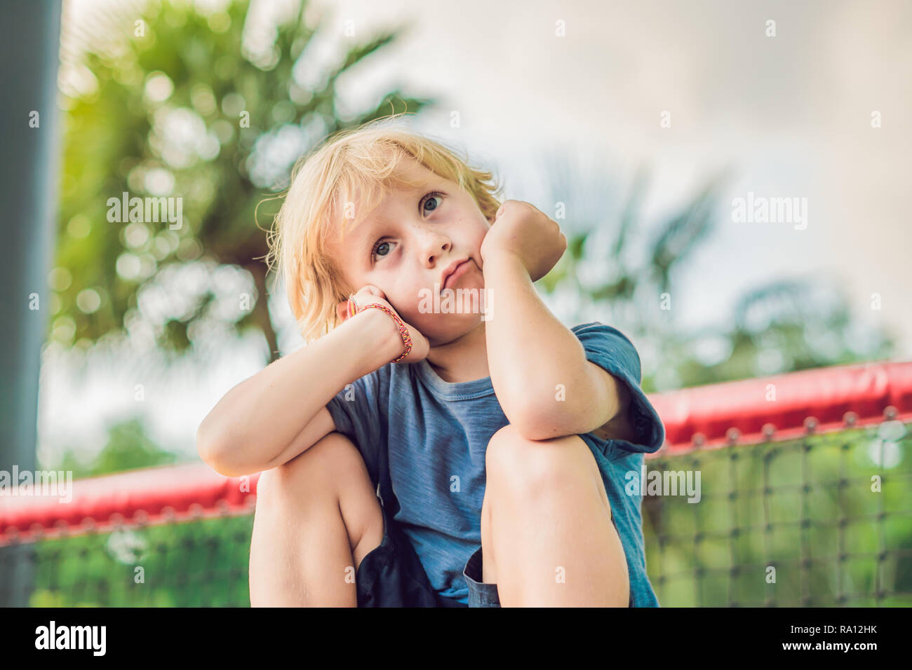 Adorable little toddler boy having fun on playground Stock Photo - Alamy