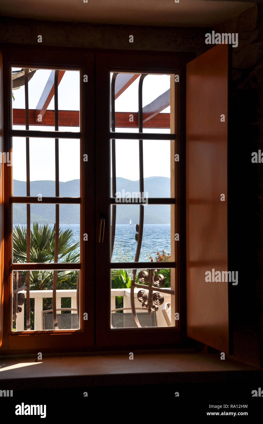 Wooden window looking out to the sea hi-res stock photography and ...