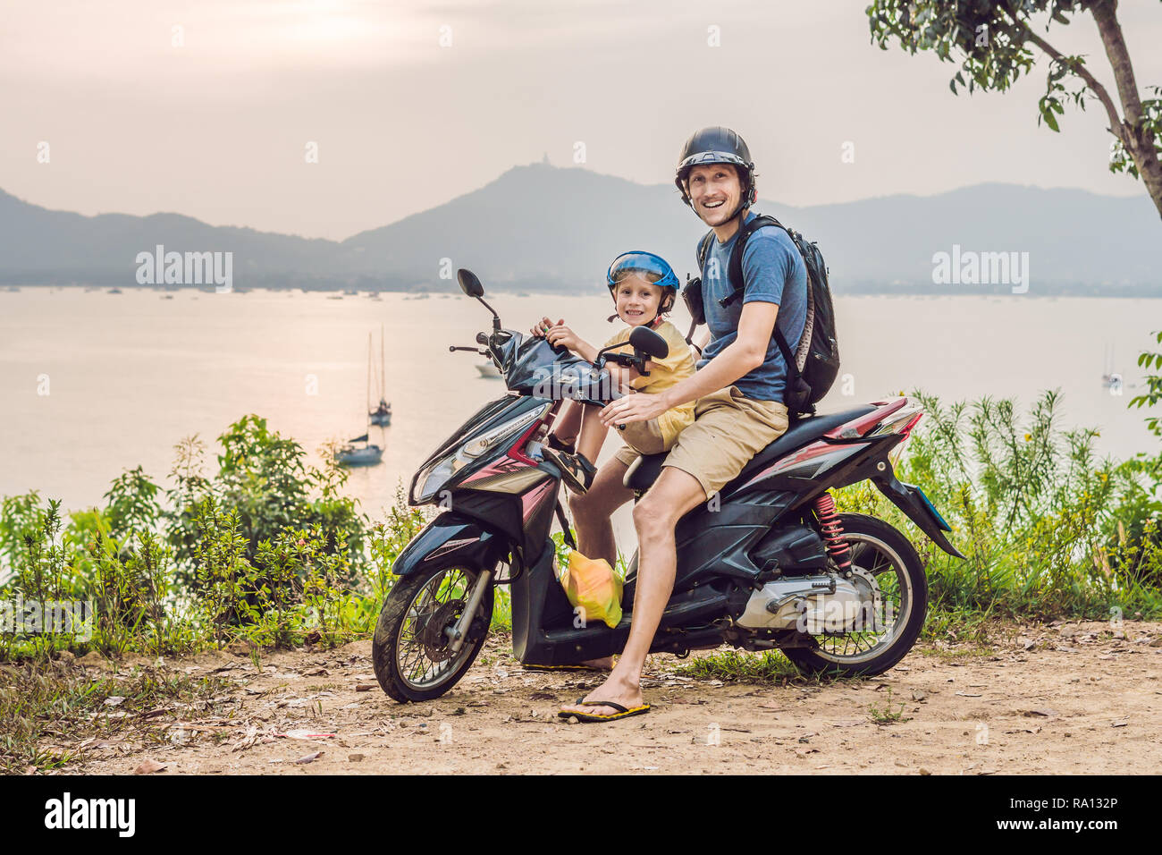 Father son cycling sunset hi-res stock photography and images - Alamy