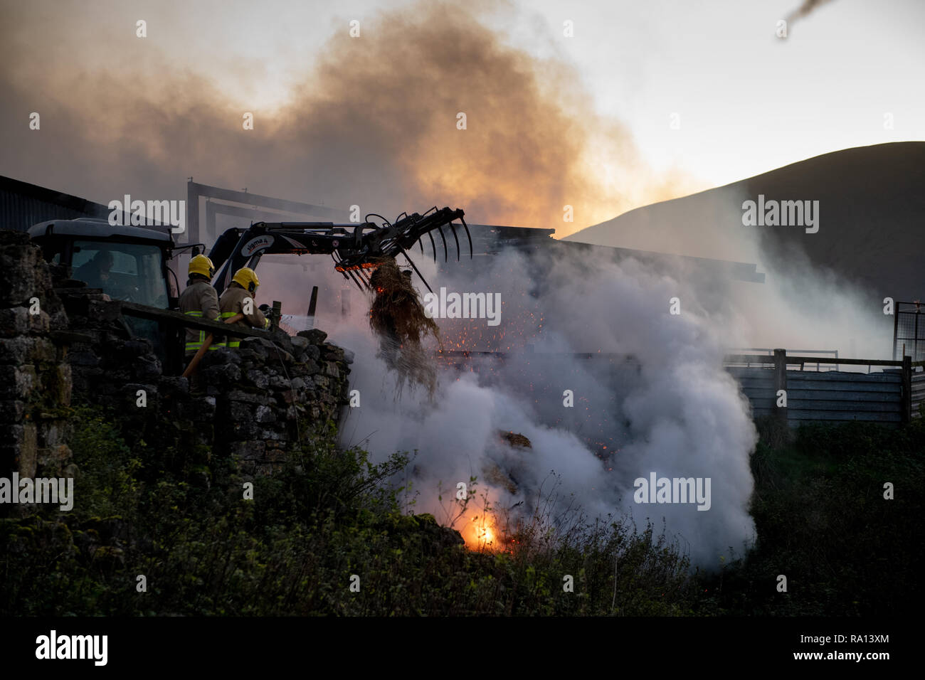 Fire crew attending a barn fire, Cumbria, UK Stock Photo - Alamy