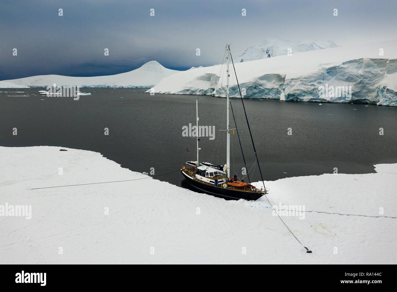 Docking / anchoring the sail boat to the sea ice near Port Lockroy ...