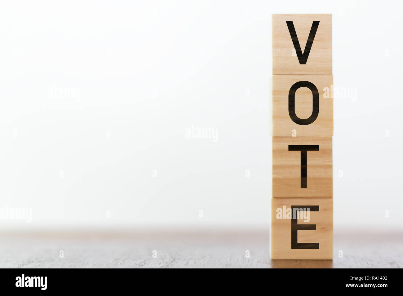 White cubes word `vote` hi-res stock photography and images - Alamy