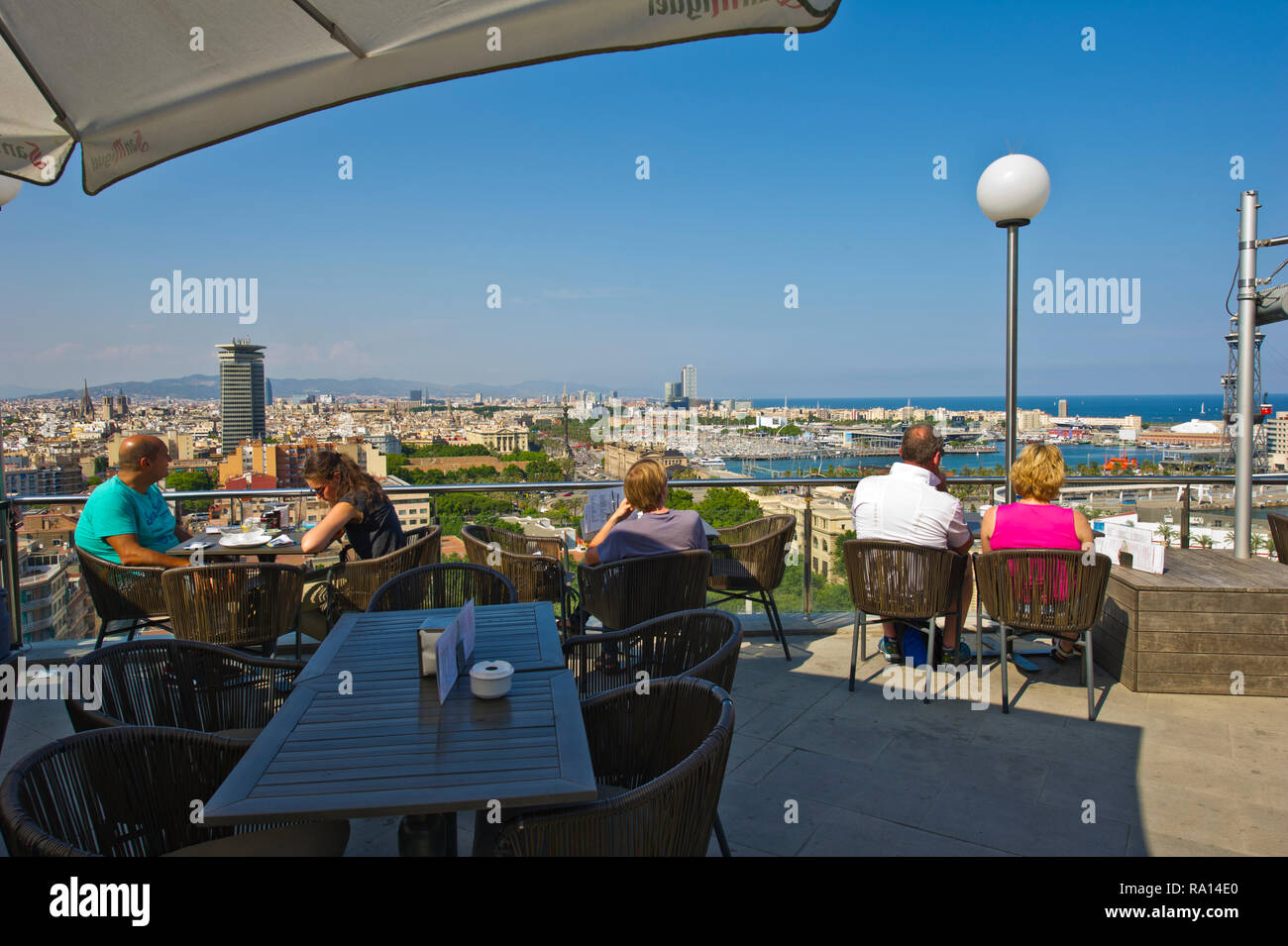 People sitting in a cafe overlooking the City of Barcelona, Spain Stock ...