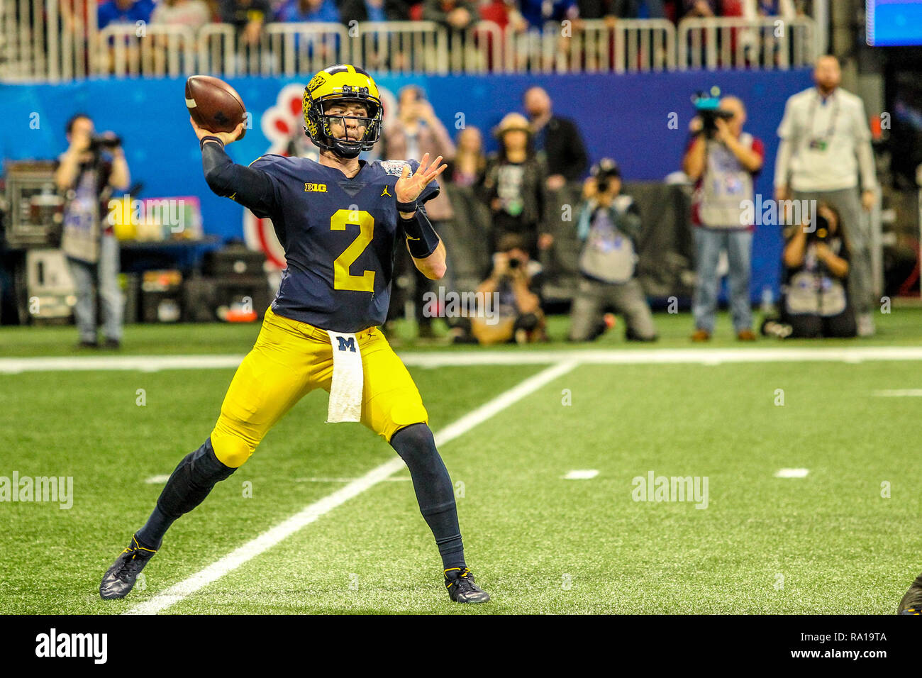 December 29, 2018: Michigan's Shea Patterson (2) sets to pass during ...