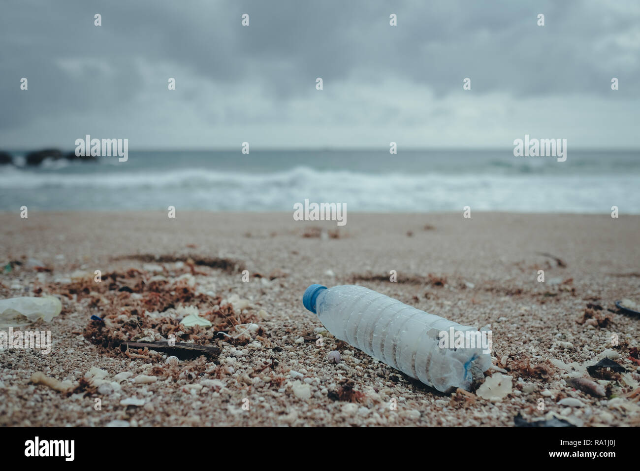 Trash, plastic, garbage, bottle... environmental pollution on the beach ...