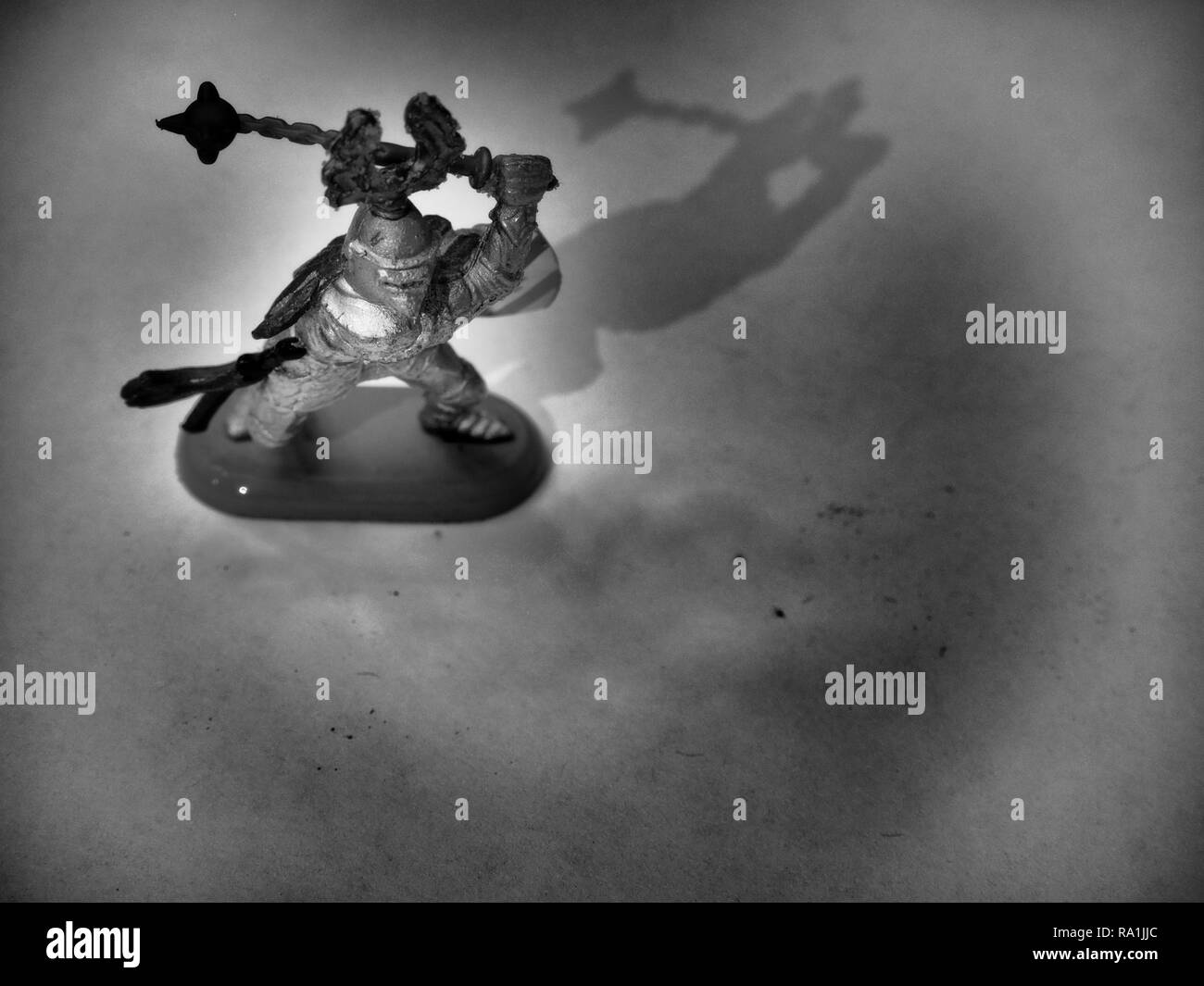 Black and White Image of Knight Wielding Flail on Wooden Table Stock ...