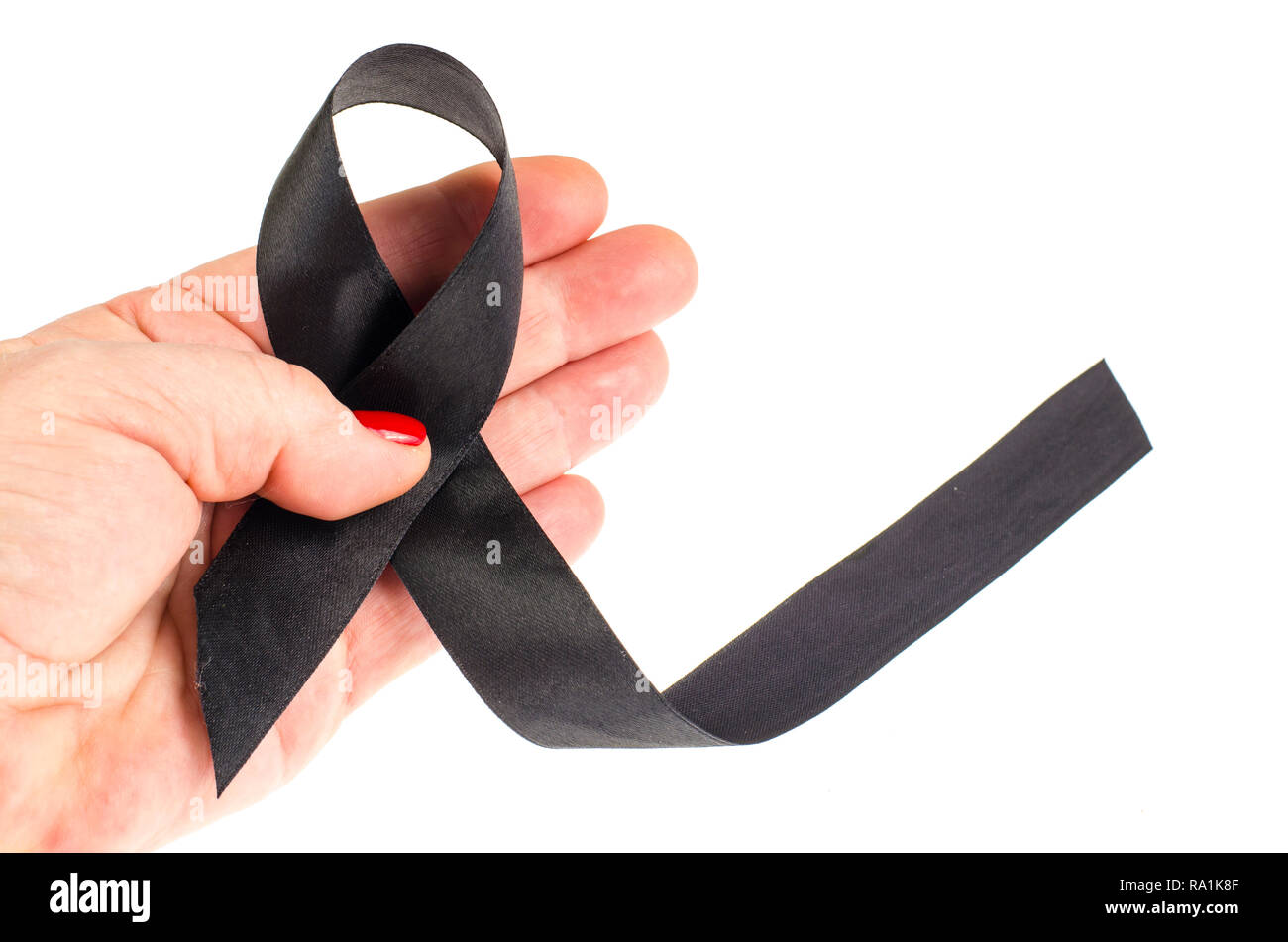 Black ribbon awareness for melanoma and skin cancer. Studio Photo Stock ...