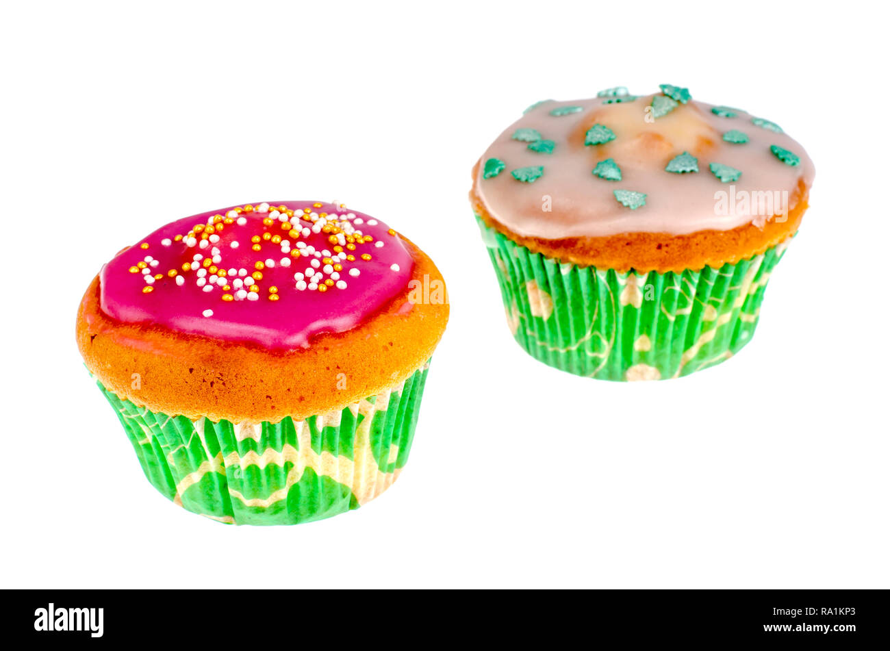 Two homemade delicious cupcakes Cut Out Stock Images & Pictures - Alamy