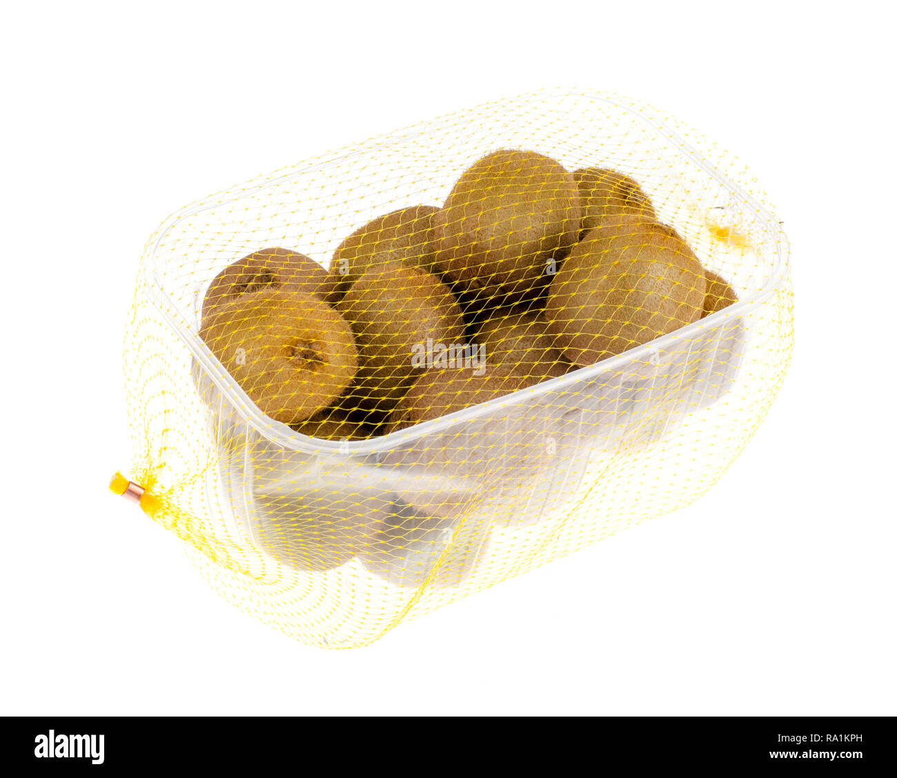 Fresh green kiwi in packaging isolated on white background. Studio ...