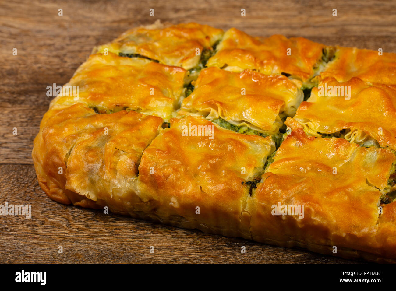 Georgian traditional Achma pie with cheese Stock Photo - Alamy