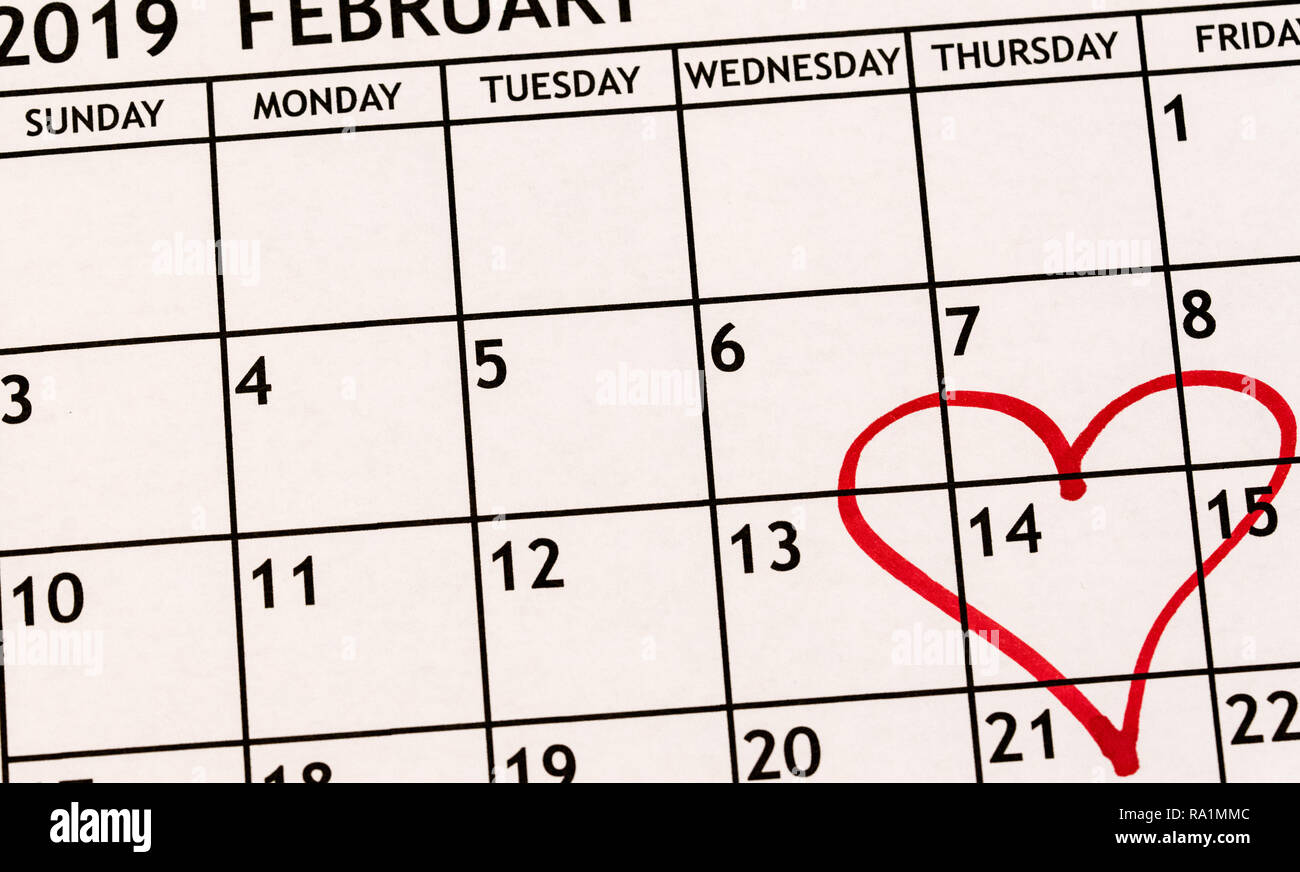 monthly calendar February detail view with a red heart drawn on the ...