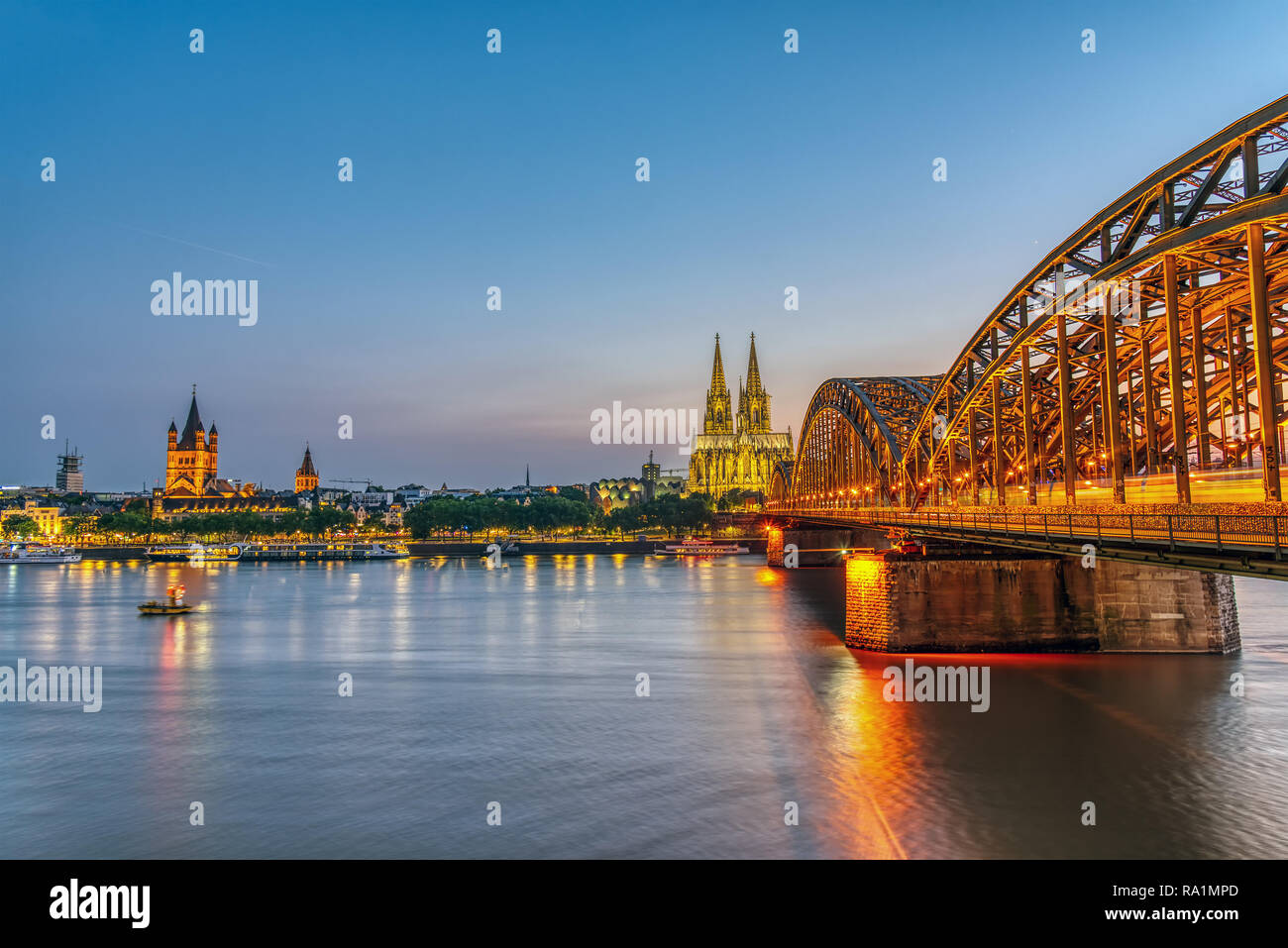 The river Rhine with the famous skyline of Cologne after sunset Stock ...