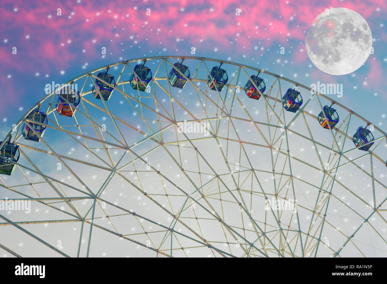 Vintage photo with ferris wheel against the moon colorful sky Stock ...