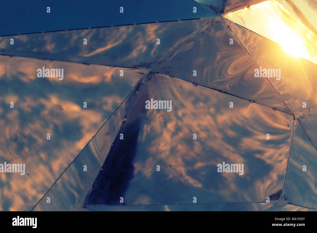 abstract metal background. sun is reflecting on it Stock Photo - Alamy