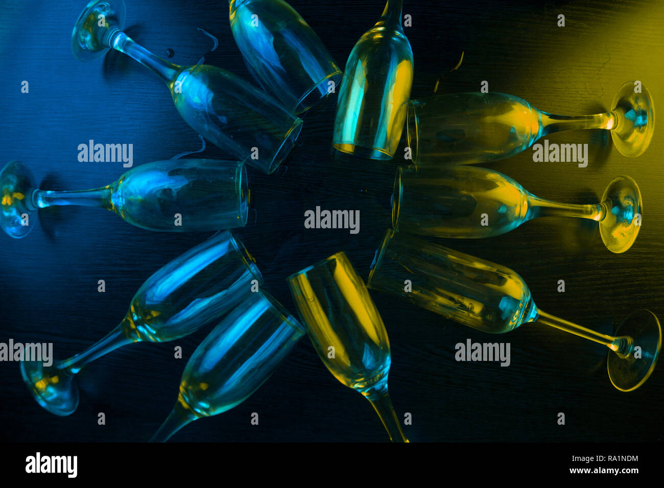 many glasses in neon light. party concept Stock Photo - Alamy