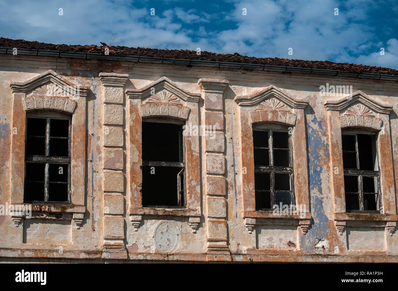 Old abandoned retro vintage weathered grunge house facade with ...
