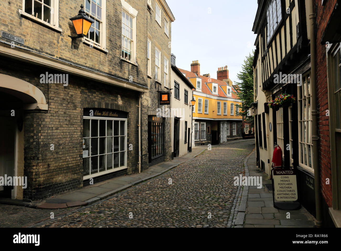Architecture and shops along the narrow cobbled street of Elm Hill, the ...