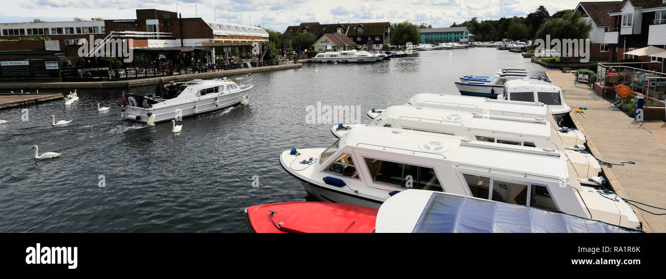 Pleasure boats on the River Bure at Wroxham town in the Norfolk Broads ...