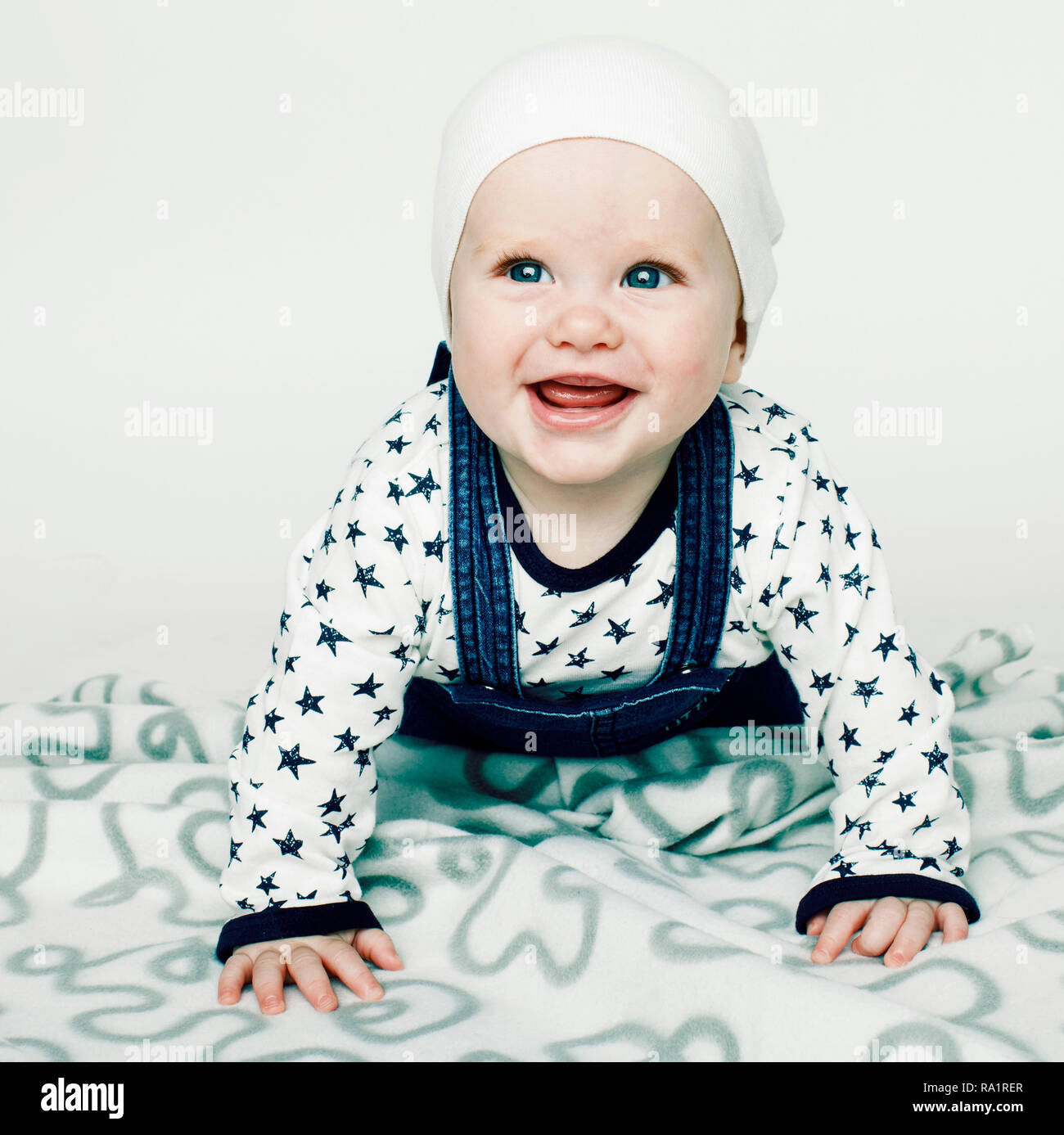 little cute baby toddler on carpet isolated close up smiling ado Stock ...
