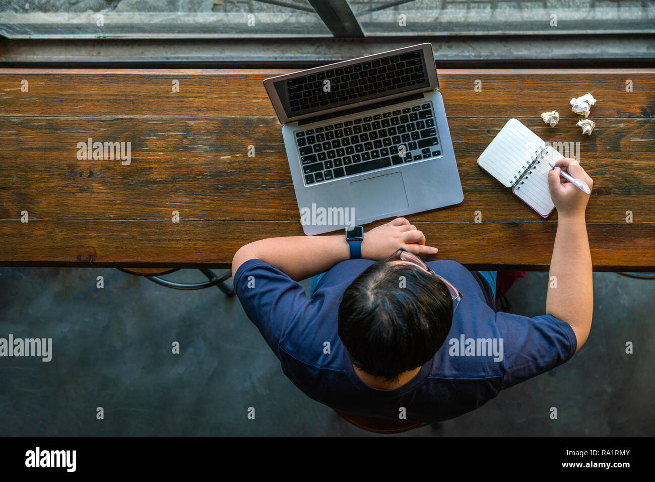 Top view of woman writing notes Stock Photo - Alamy