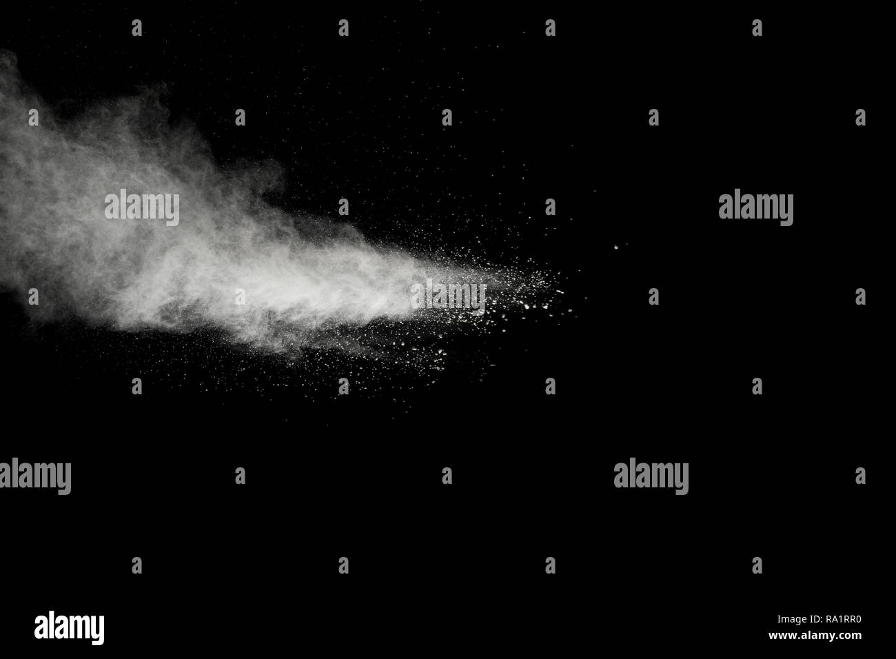 White powder explosion on black background.Stopping the movement of ...