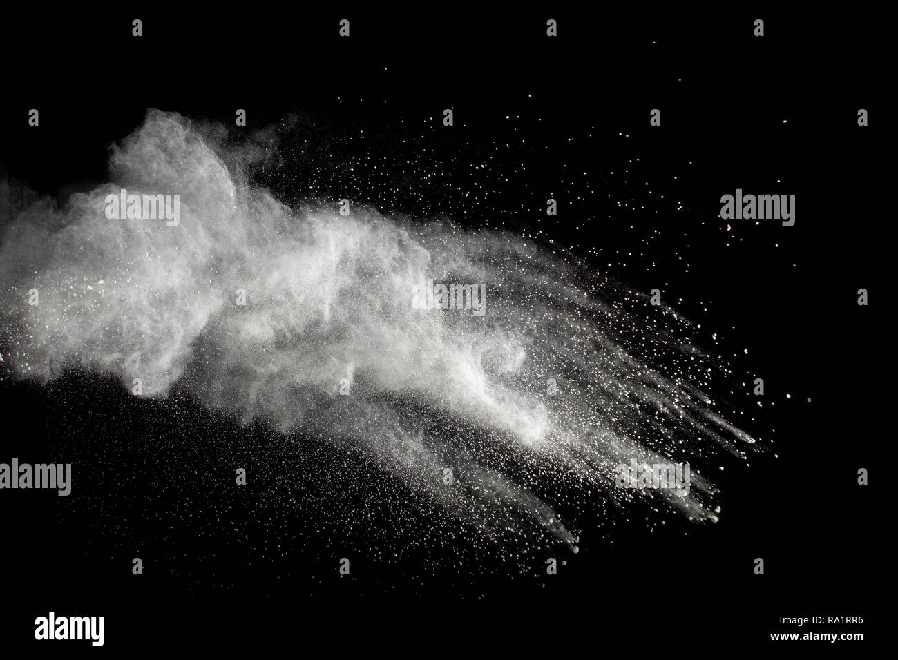 White powder explosion on black background.Stopping the movement of ...