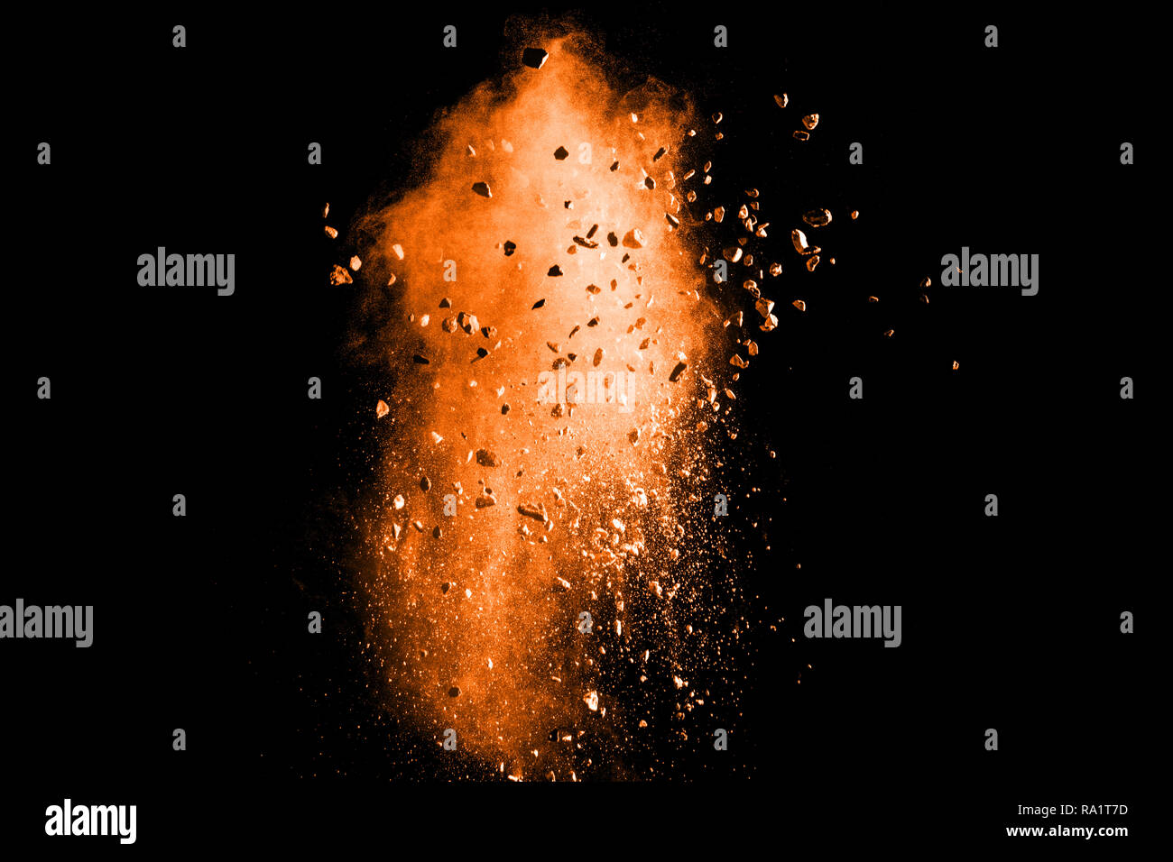 abstract orange powder explosion on black background. abstract orange ...