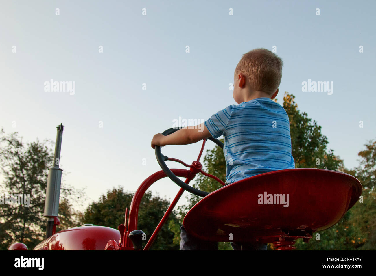 Boy pretending to drive hi-res stock photography and images - Alamy
