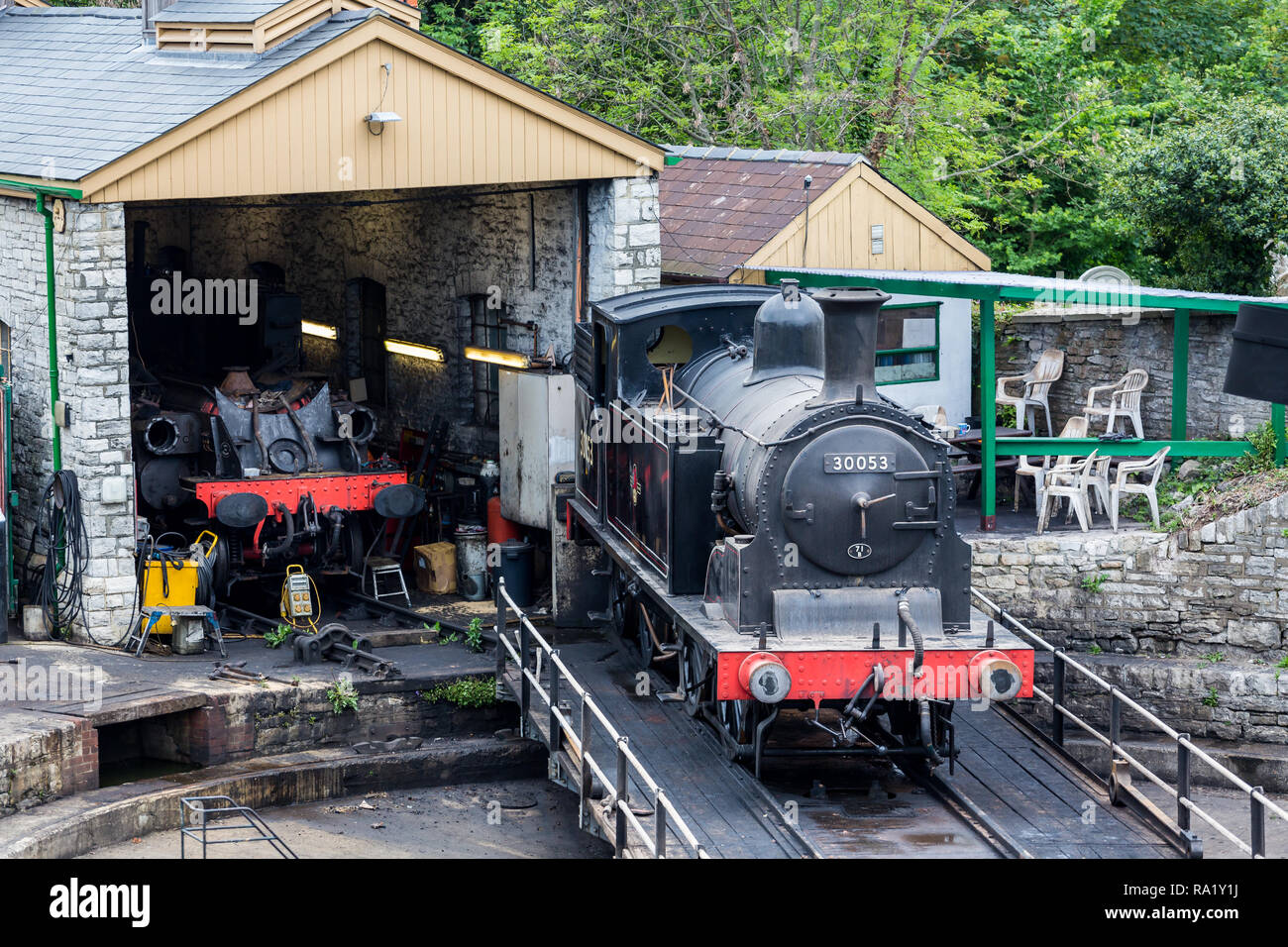 Steam engine 30053 on turning platform in repair yard at Swanage ...
