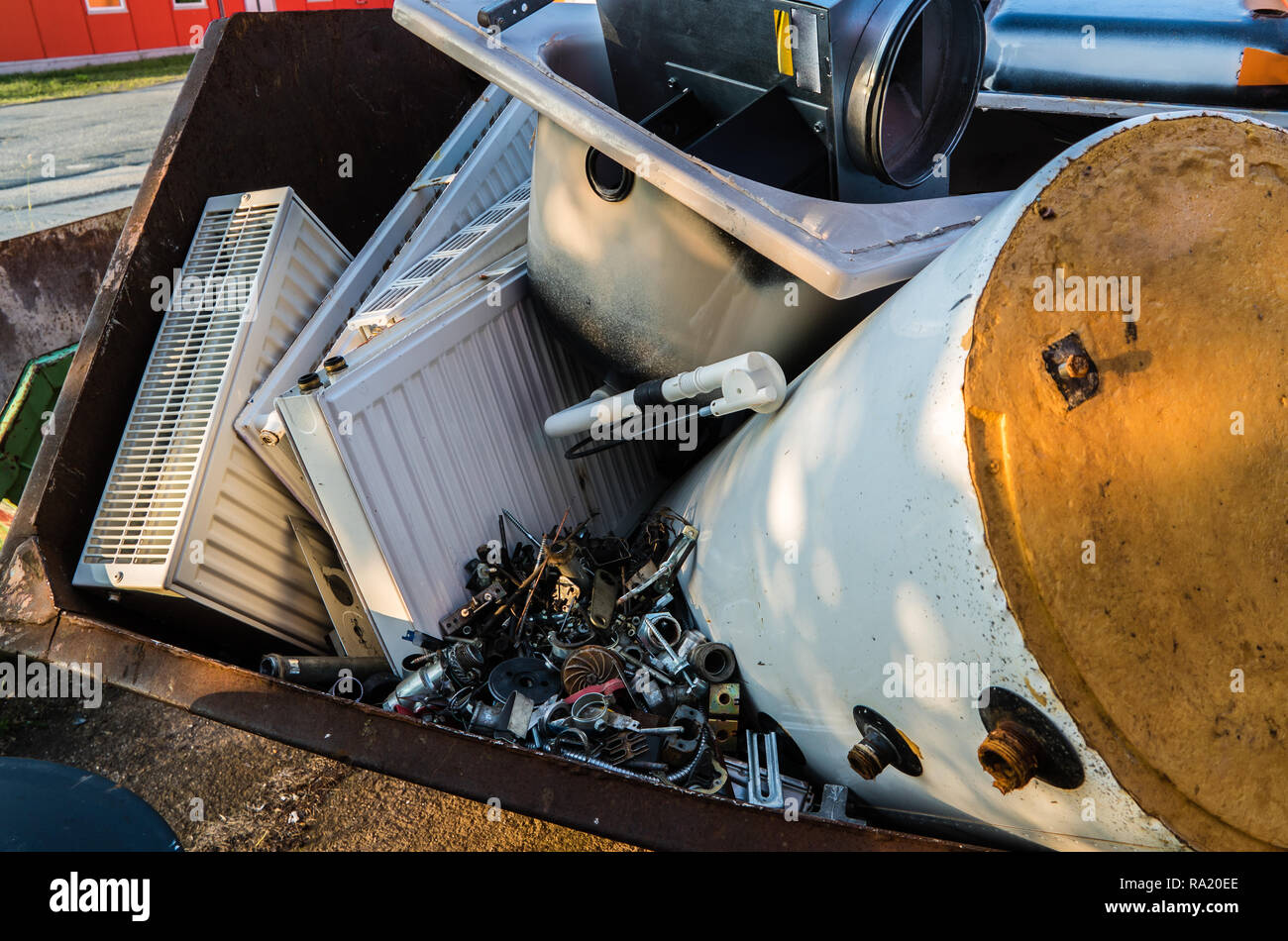 Metal scrap container Stock Photo - Alamy
