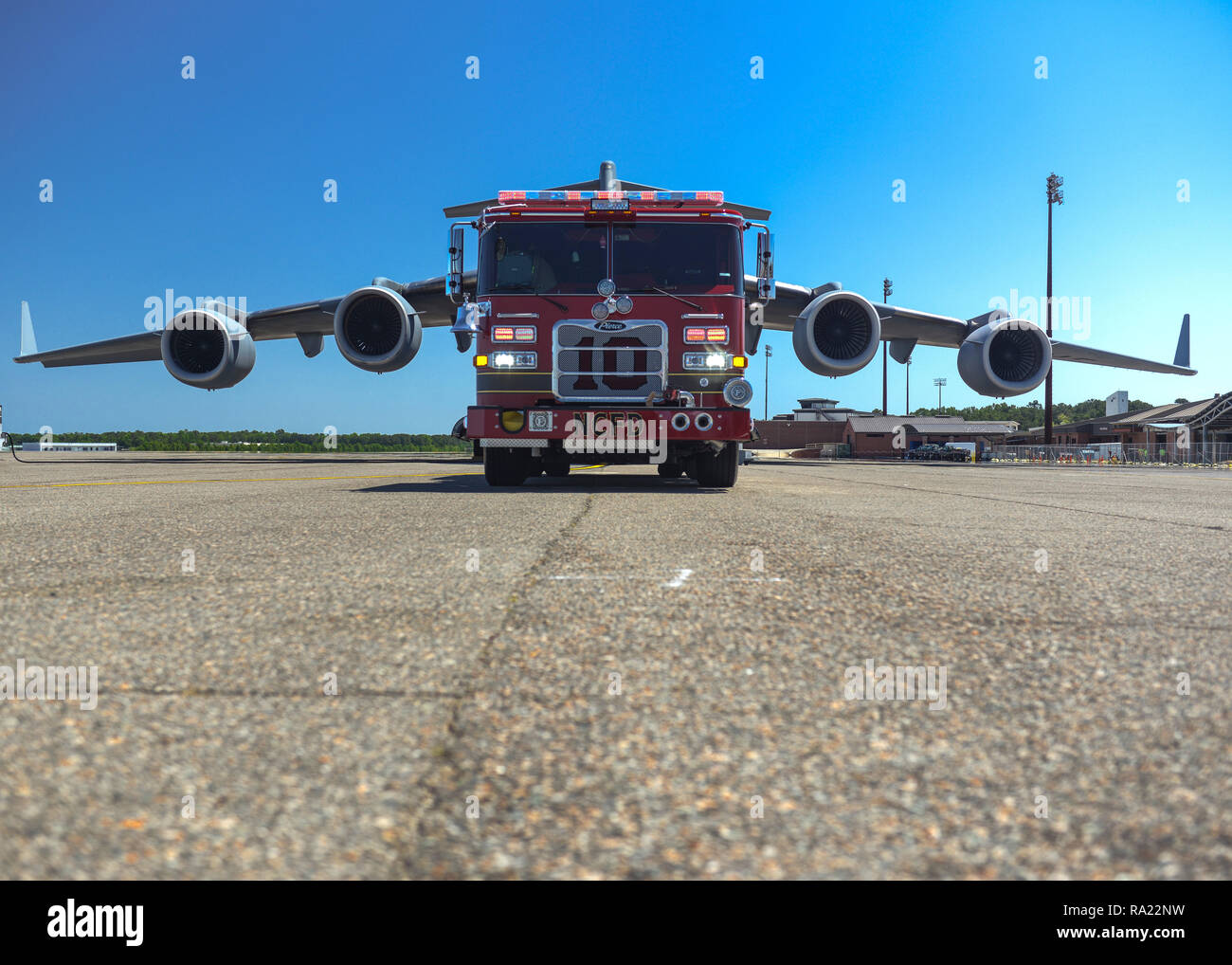 A North Charleston Fire Department truck sits in front of a C-17 ...