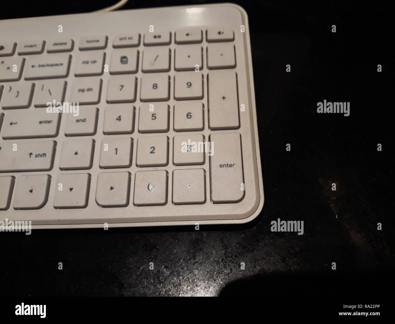 White Computer keyboard background. on the black table Stock Photo - Alamy