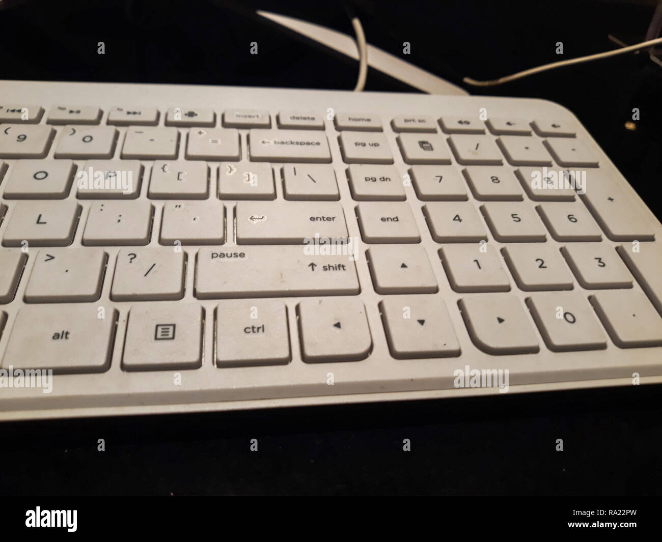 White Computer keyboard background. on the black table Stock Photo - Alamy