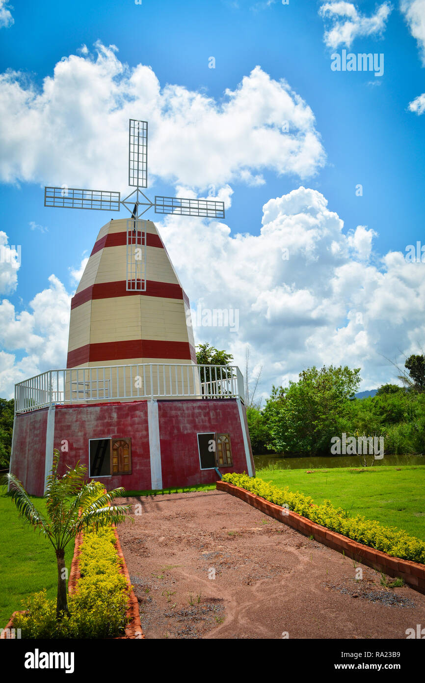windmill in the garden and blue sky background / Wind turbine Stock ...