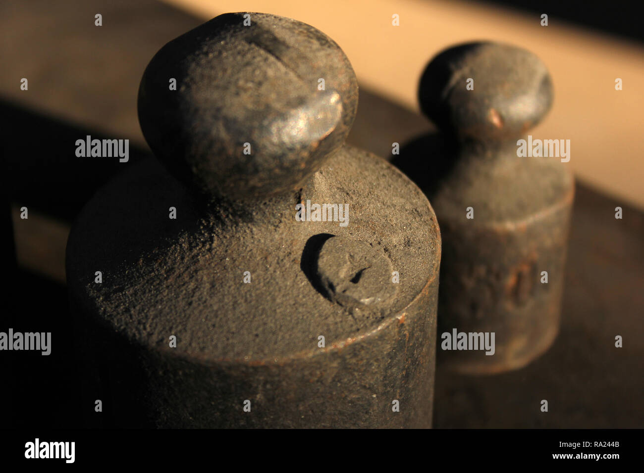 Old iron weight measurement units Stock Photo - Alamy