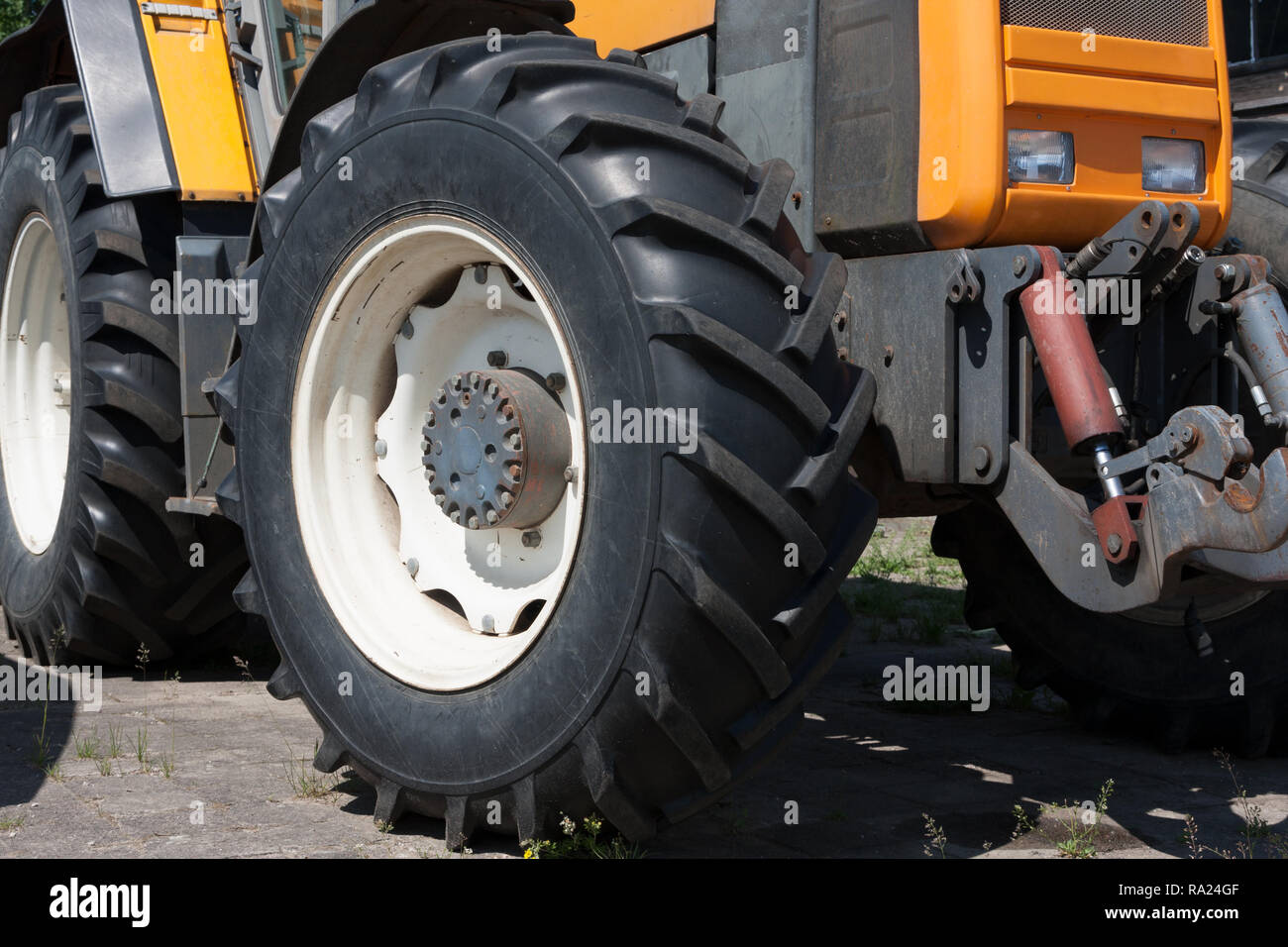 Agricultural machinery. Tractor after work in the parking lot Stock ...