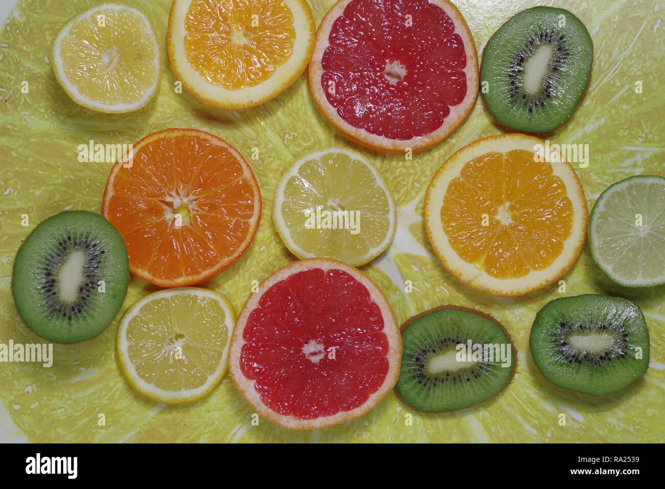 background with cut citrus fruits Stock Photo - Alamy