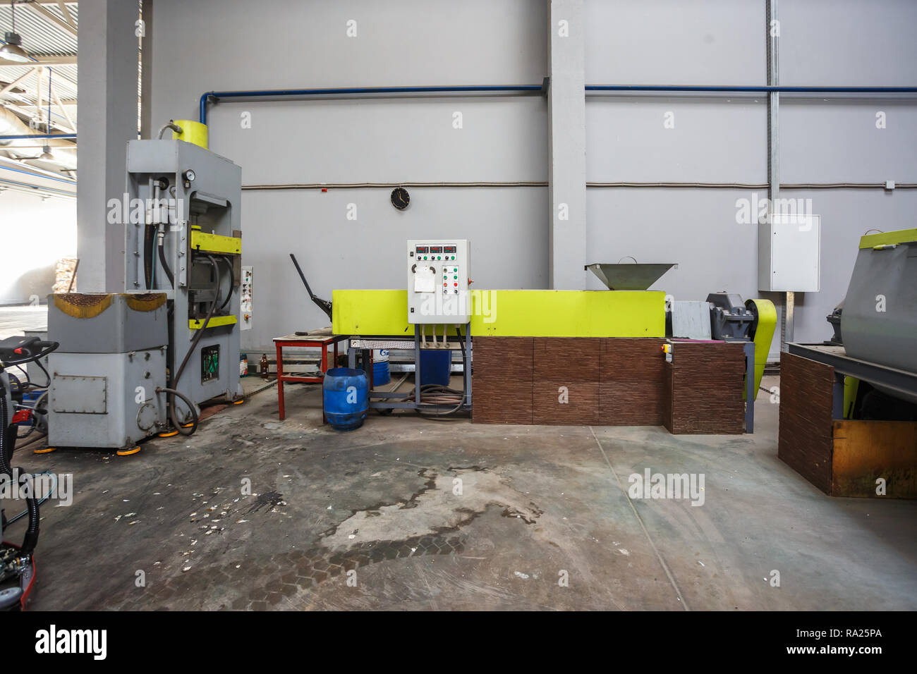 garbage press on modern waste recycling processing plant. Separate ...