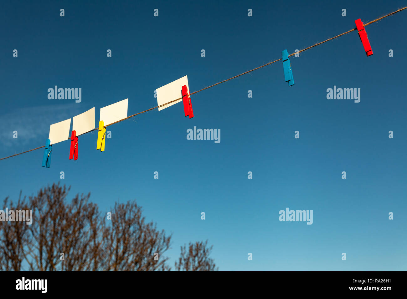 Business cards pegged to a washing line (can add text Stock Photo - Alamy