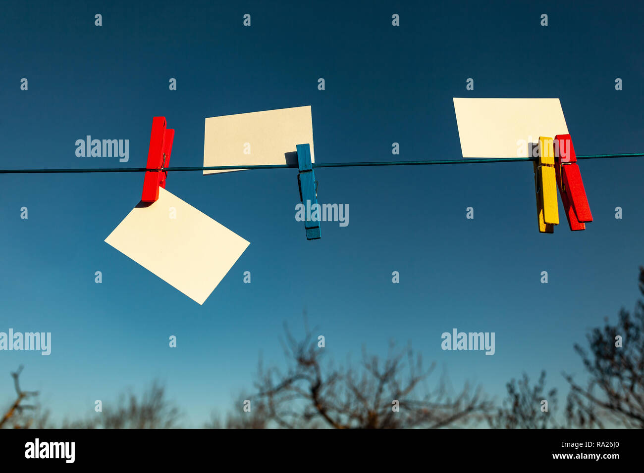 Business cards pegged to a washing line (can add text Stock Photo - Alamy