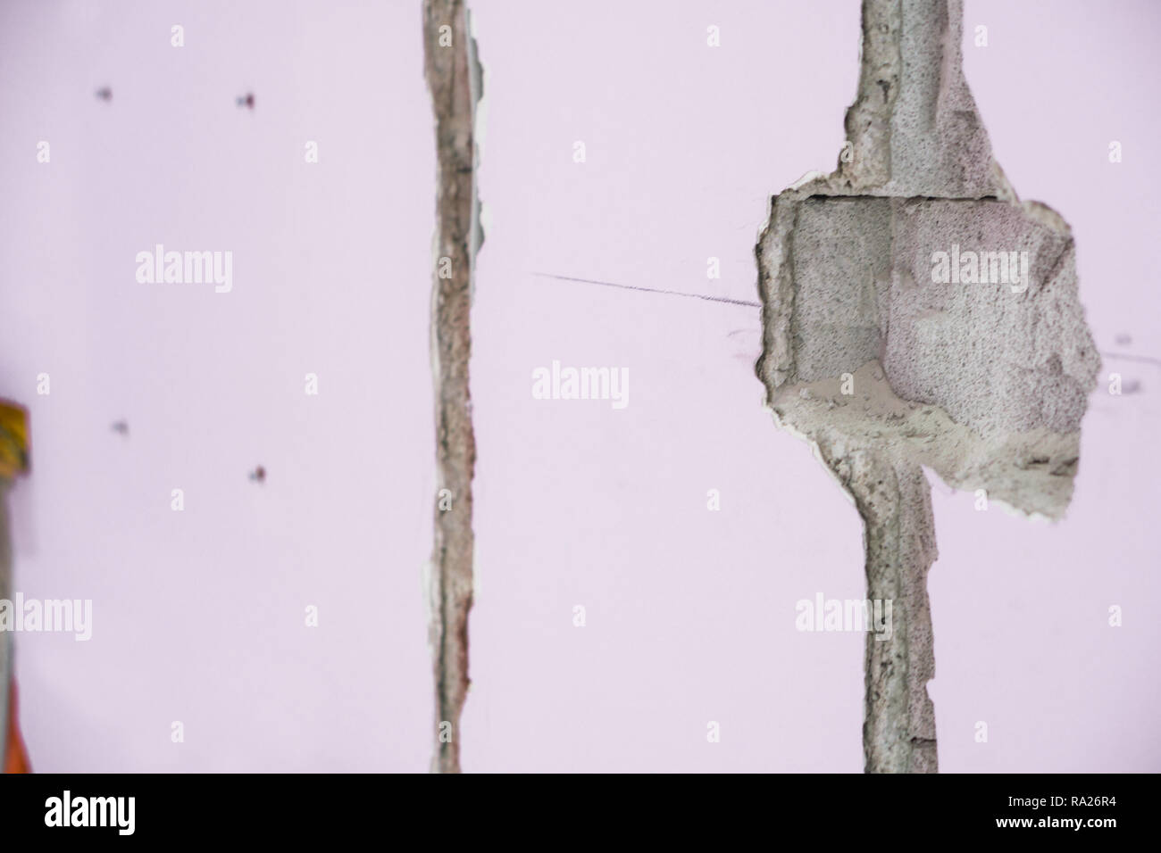 Renovation interior. Wall ready for electrical cabels Stock Photo - Alamy