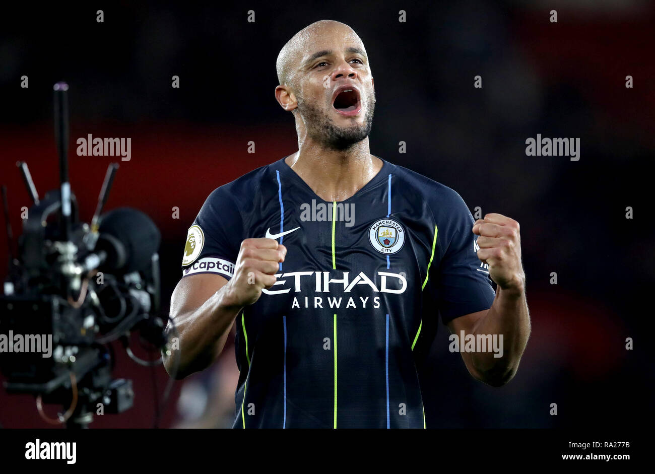 Manchester City's Vincent Kompany celebrates the results at the end of ...