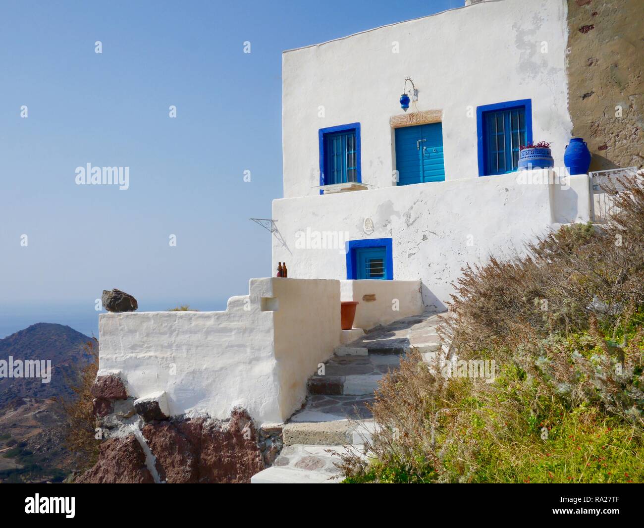 Traditional Whitewashed Greek House up on Hill with a Beautiful View of ...
