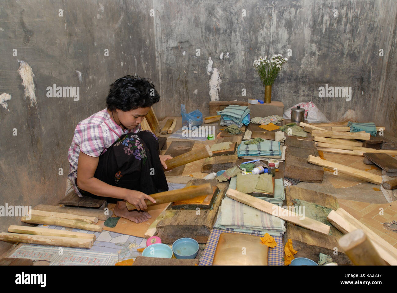 gold beating, young women beating bamboo paper with wooden sticks, thin ...