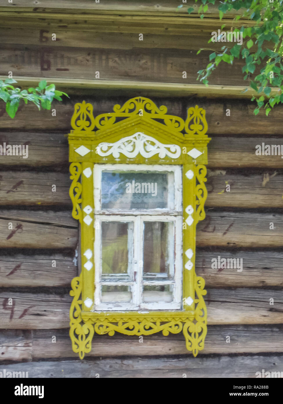 Plinths of windows of wooden houses. Ancient style of decoration of ...