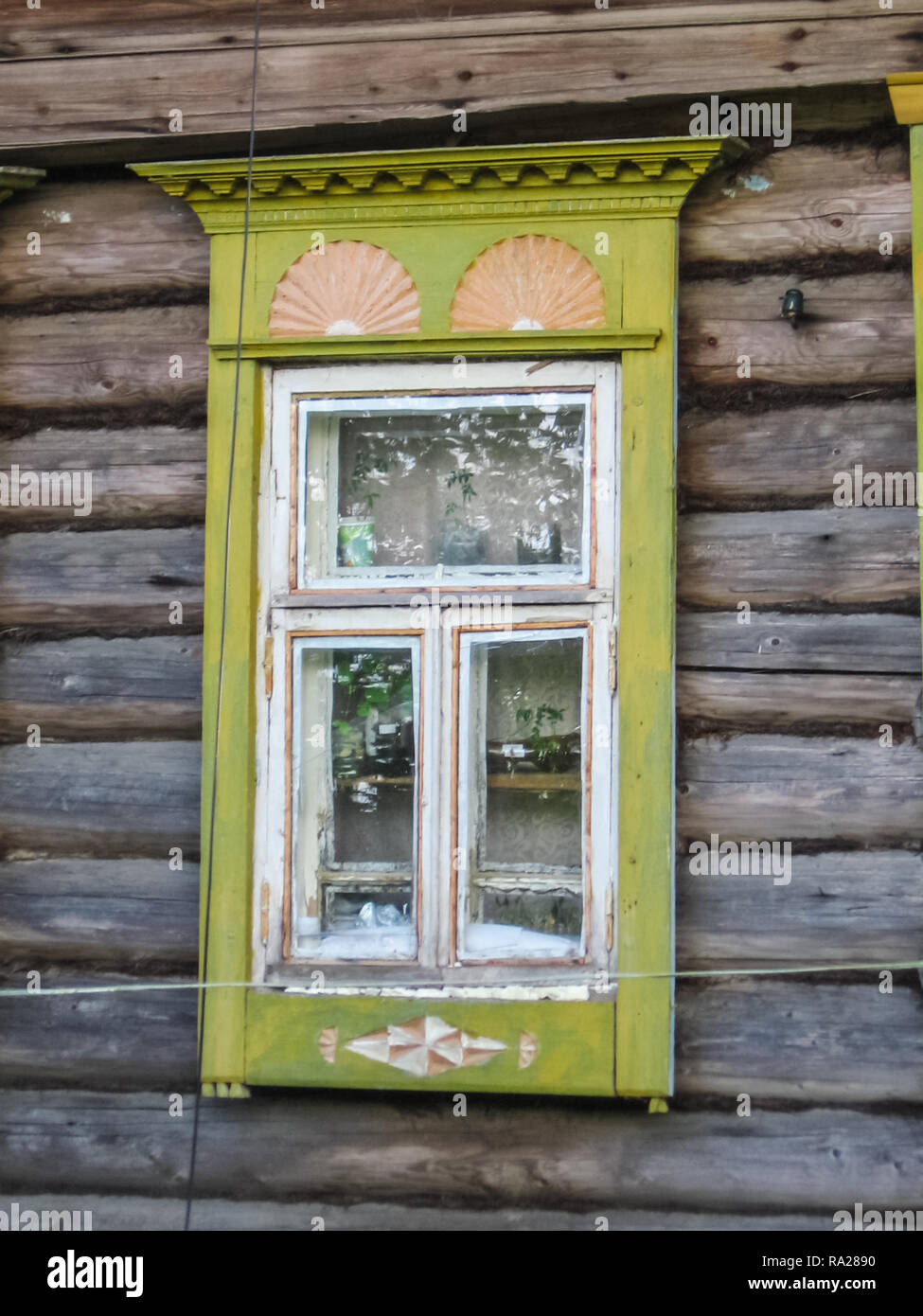 Plinths of windows of wooden houses. Ancient style of decoration of ...