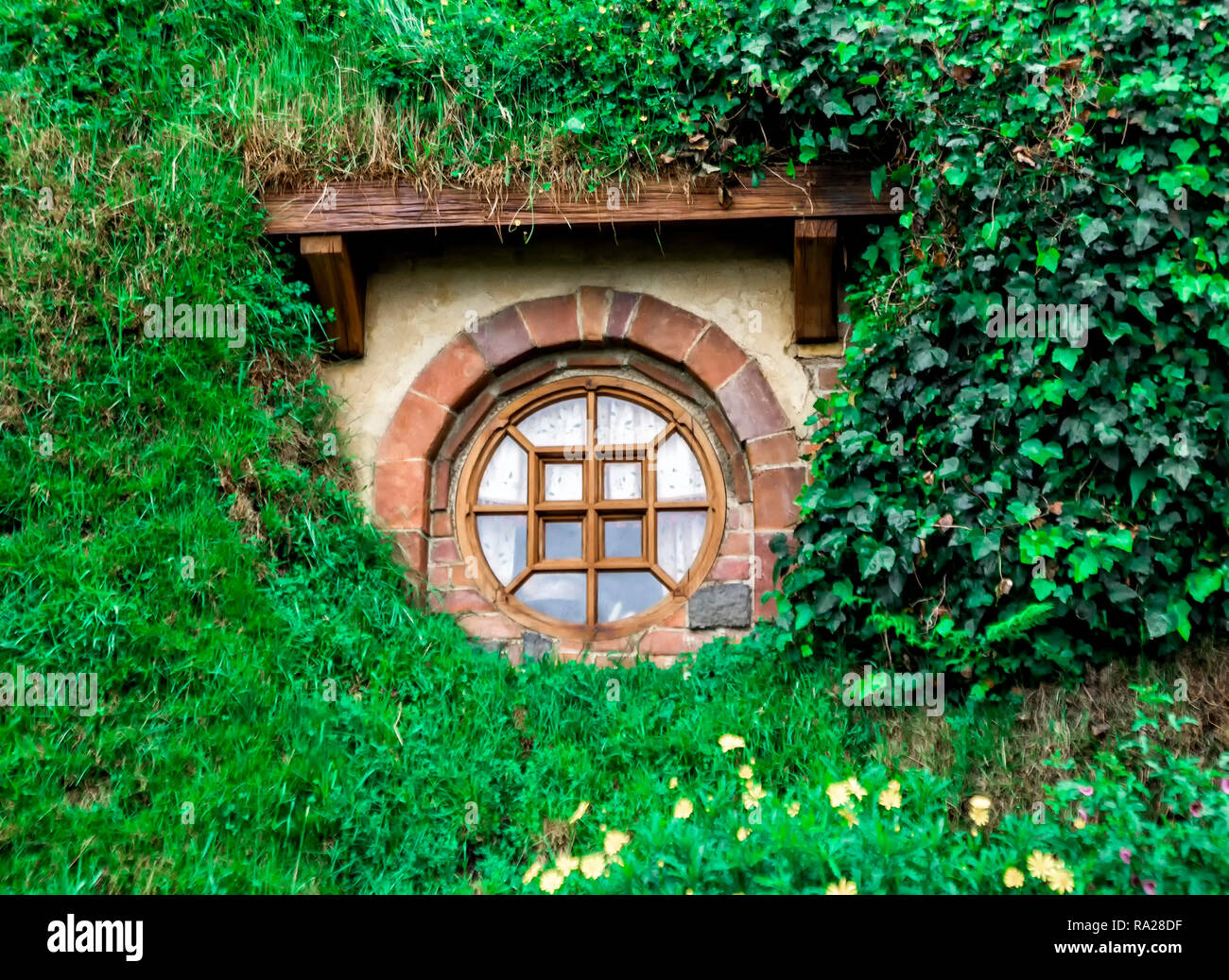 Hobbit house window hi-res stock photography and images - Alamy