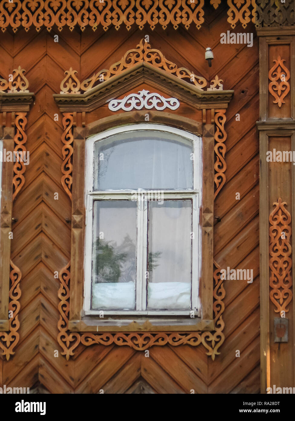 Plinths of windows of wooden houses. Ancient style of decoration of ...